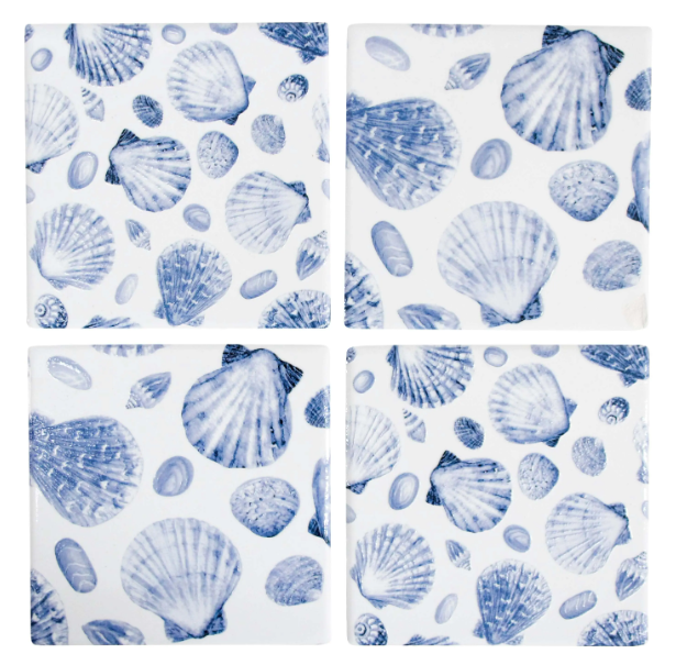Set of four ceramic coasters featuring blue coastal shell illustrations ...